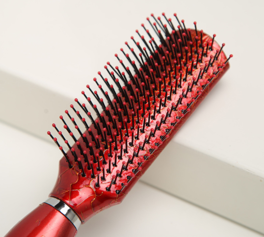 Fashion hairdressing red hair brush